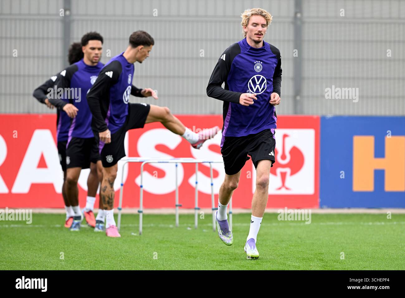 Germany's Nick Woltemade, front, attends a training session of the ...