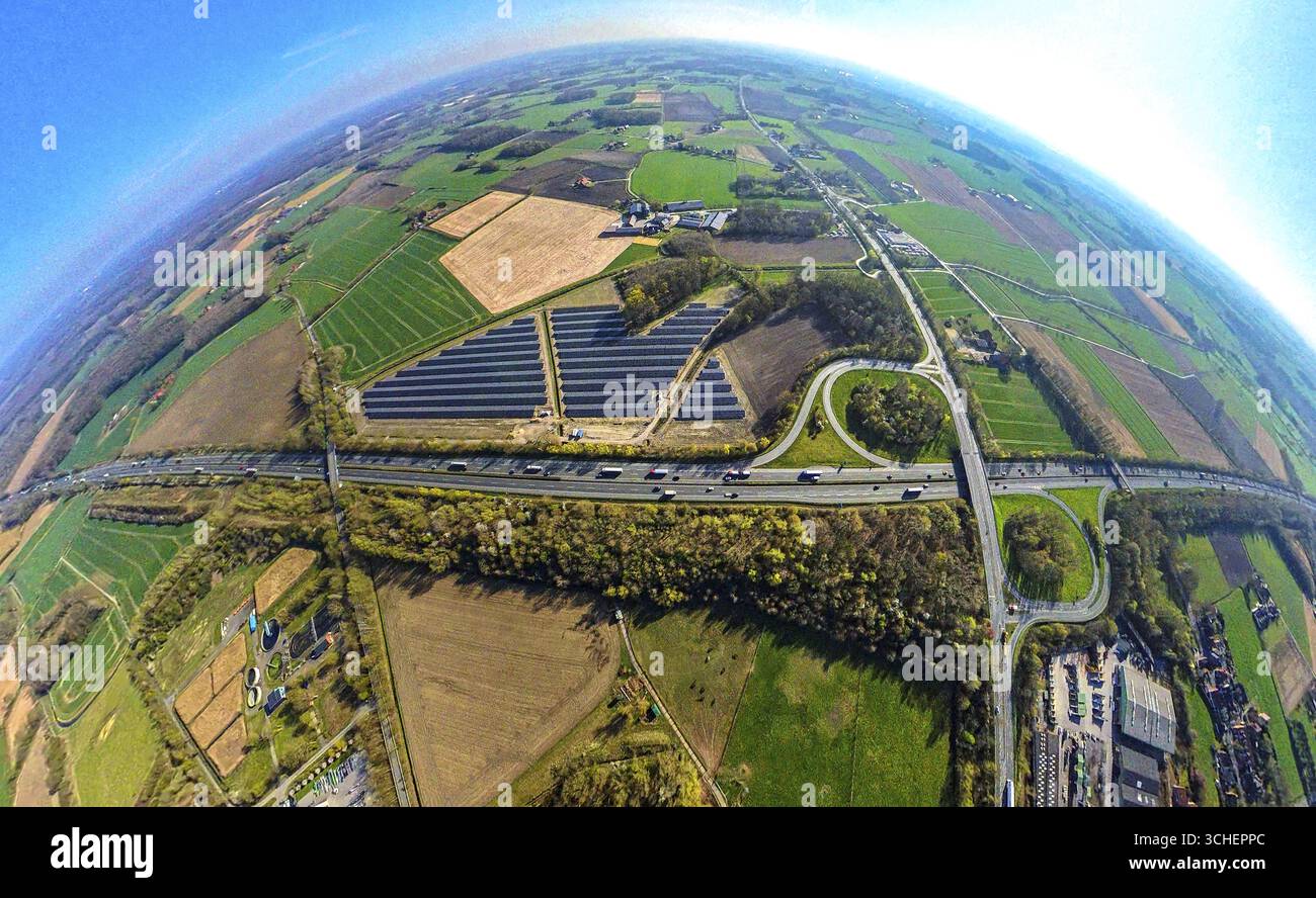 Aerial view, solar park east photovoltaic open space plant, motorway A1 ...