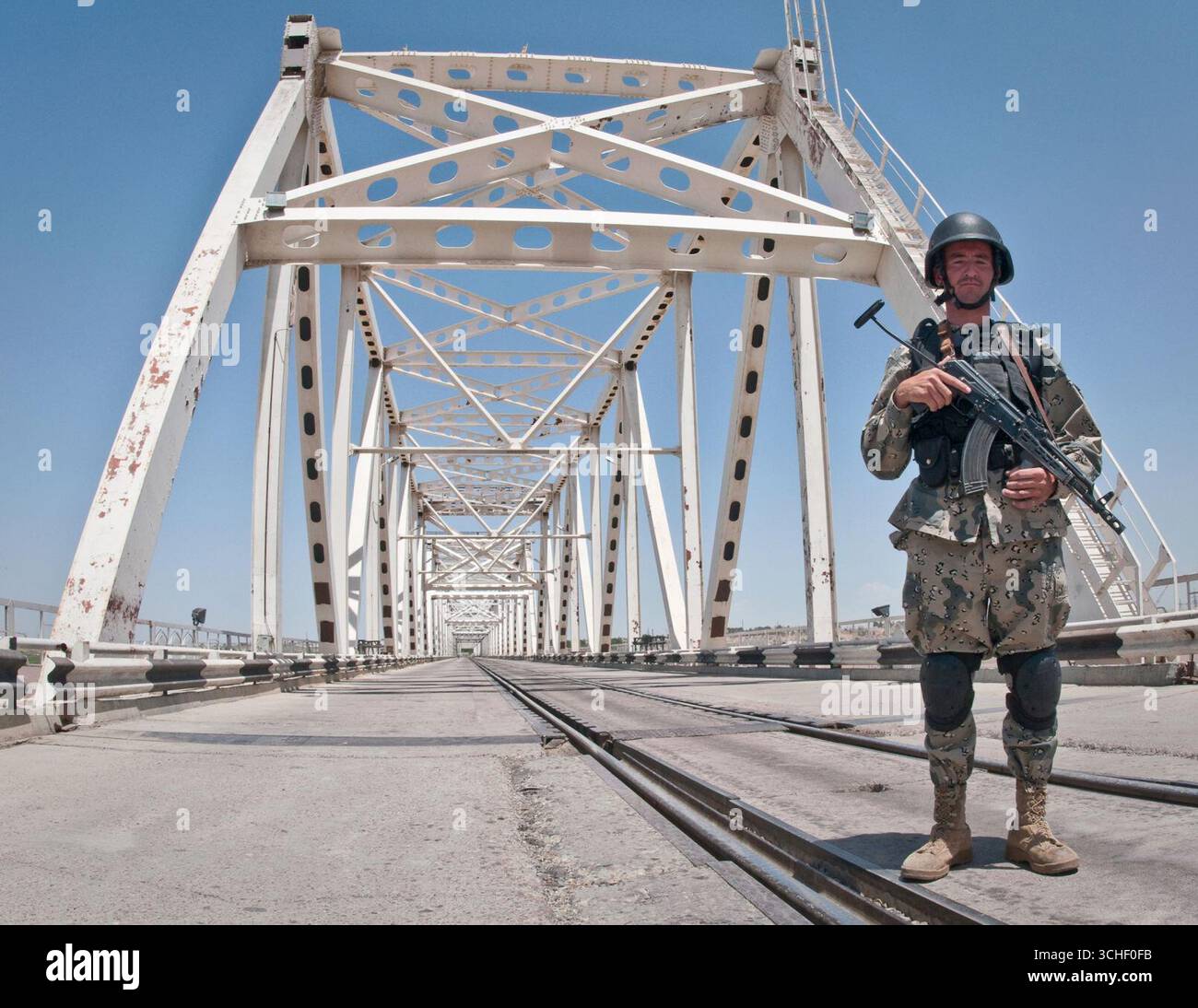 Officer of the Afghan Border Police at the Afghanistan–Uzbekistan ...