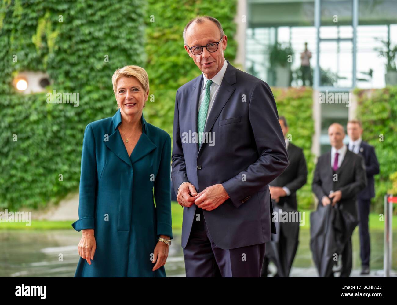 German Chancellor Friedrich Merz, front right, welcomes Swiss President ...