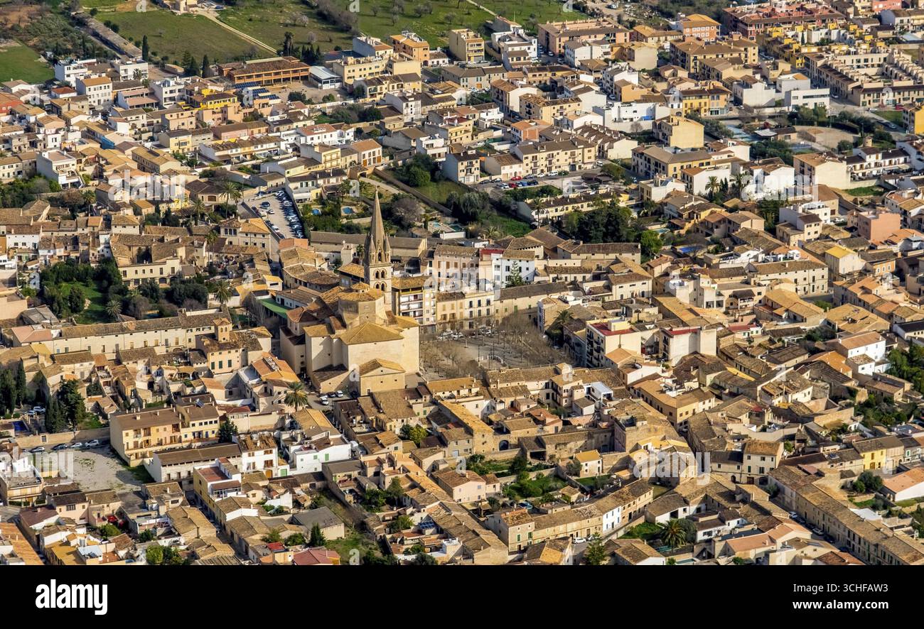Aerial view, view of the village and catholic church Esglesia de Santa ...