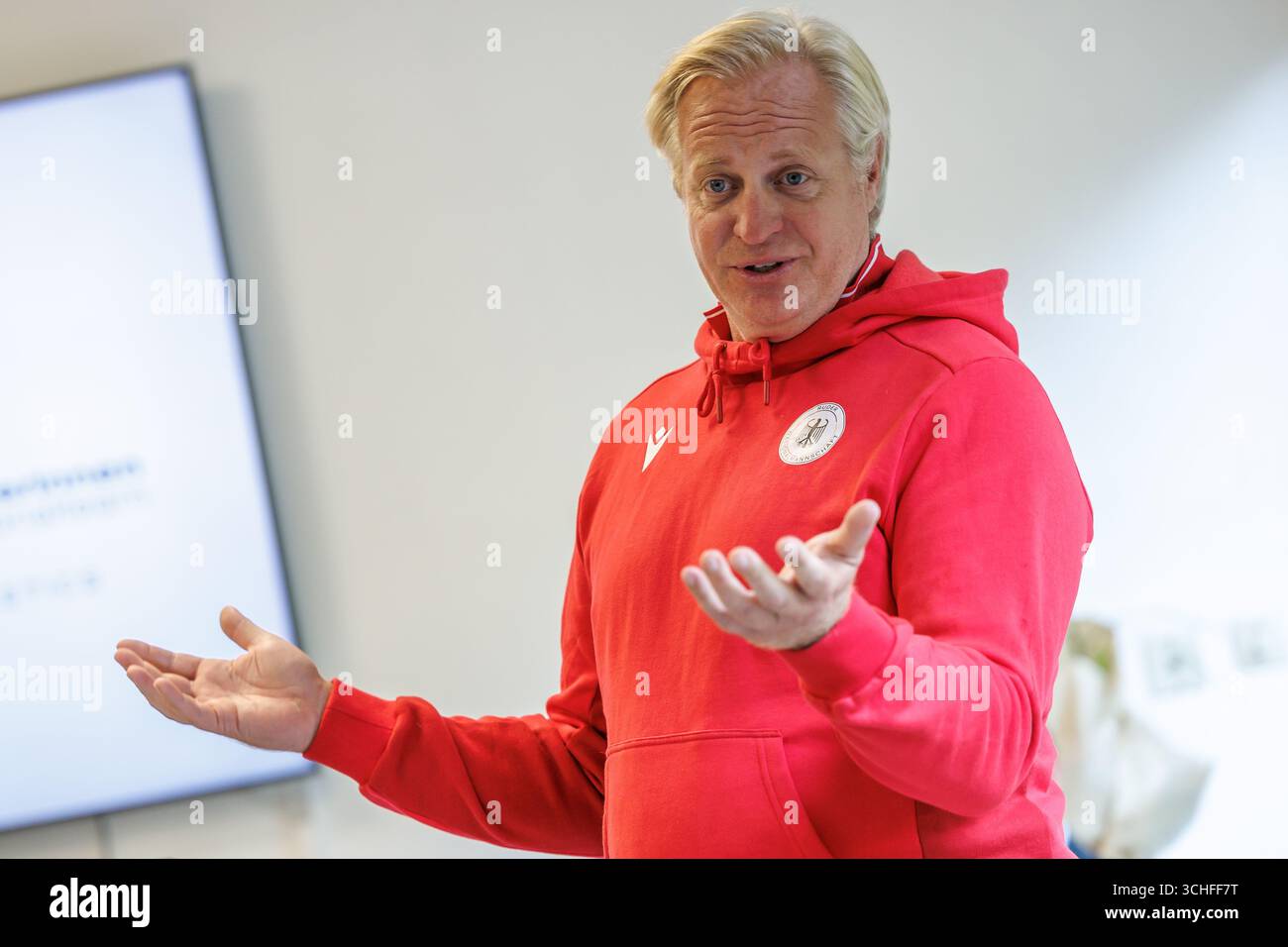 02 September 2025, Berlin: Robert Sens, Director of Competitive Sports, speaks to the audience ...