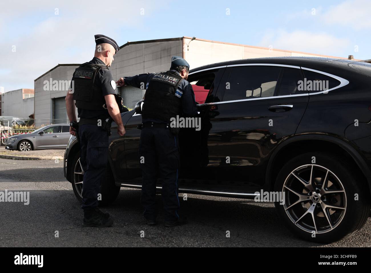 Officers carry out roadside checks as part of a joint municipal ...