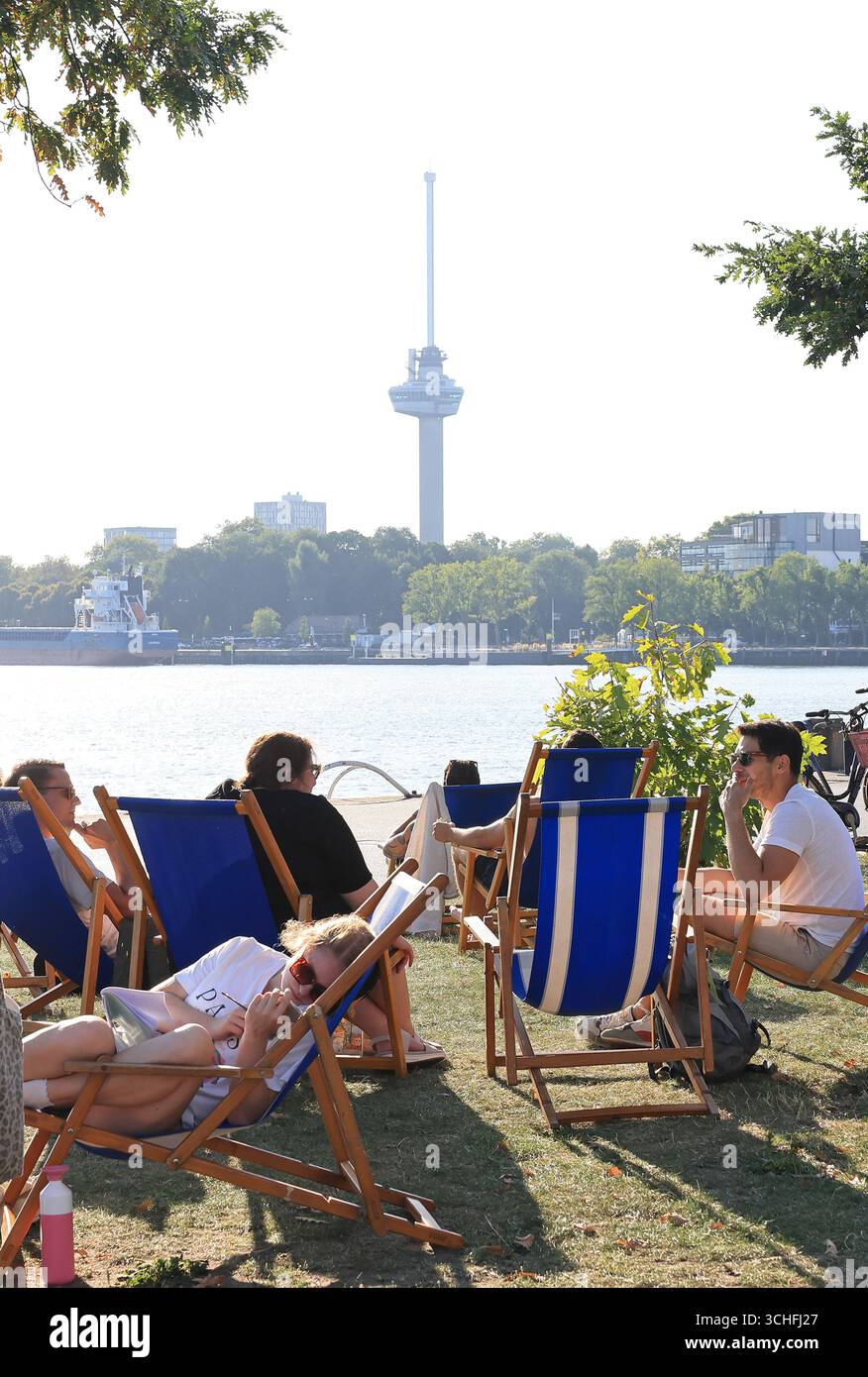 Sun terrace on Zuid by Hotel New York, with the Euromast beyond, in ...
