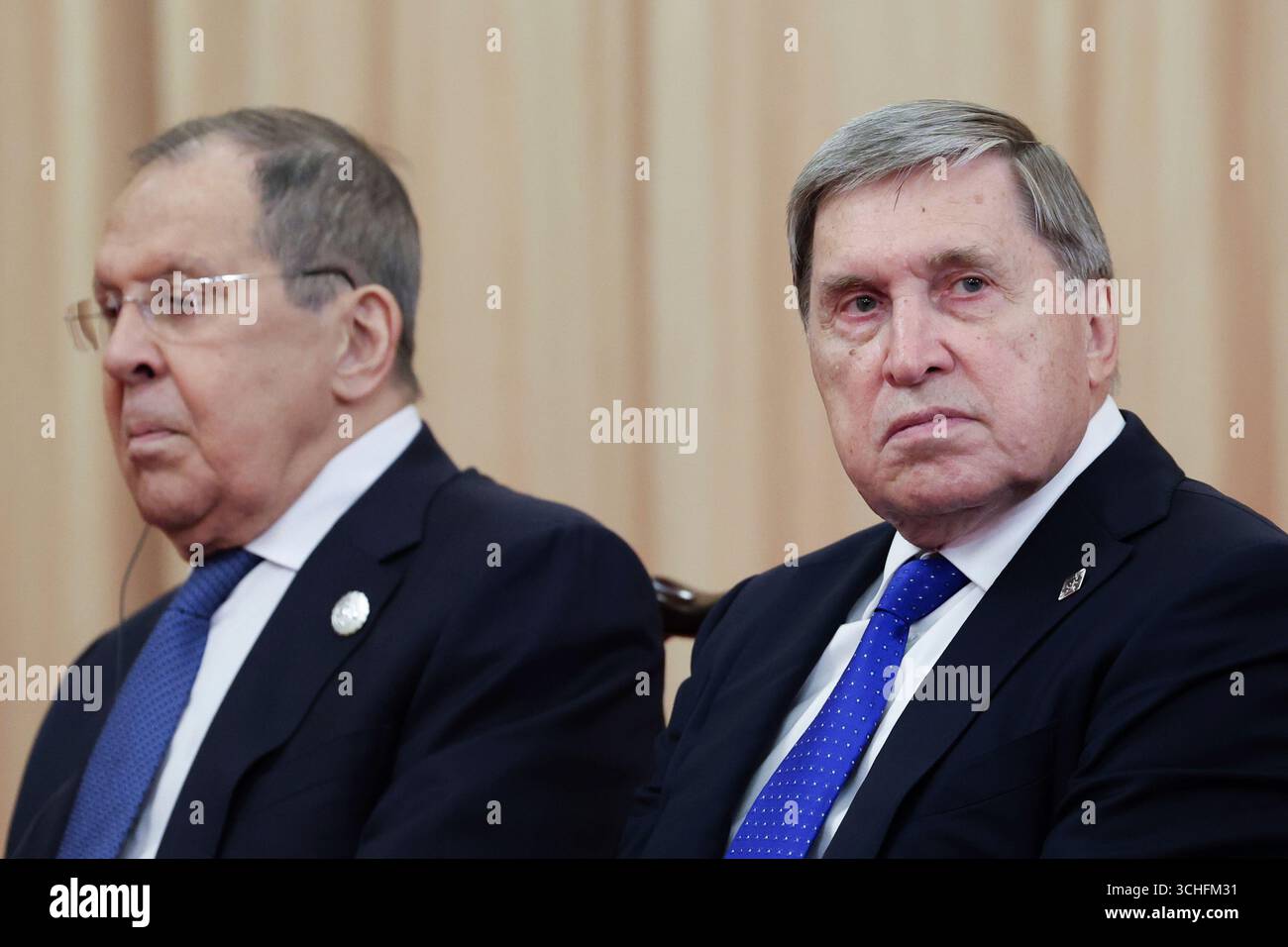 Russian Foreign Minister Sergey Lavrov, left, and Presidential Aide ...