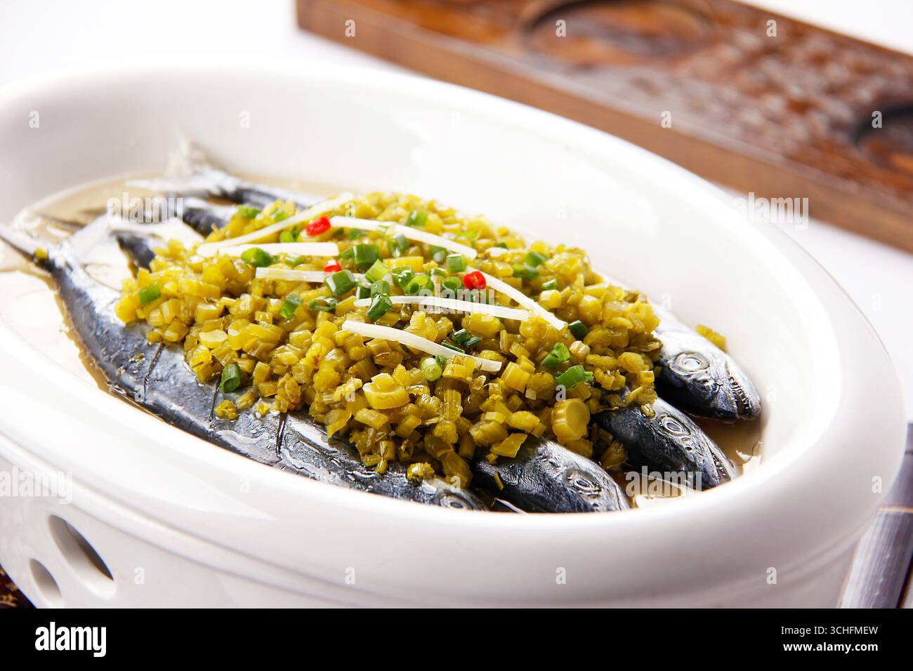 Steamed Spanish Mackerel with Pickled Mustard Greens Stock Photo - Alamy
