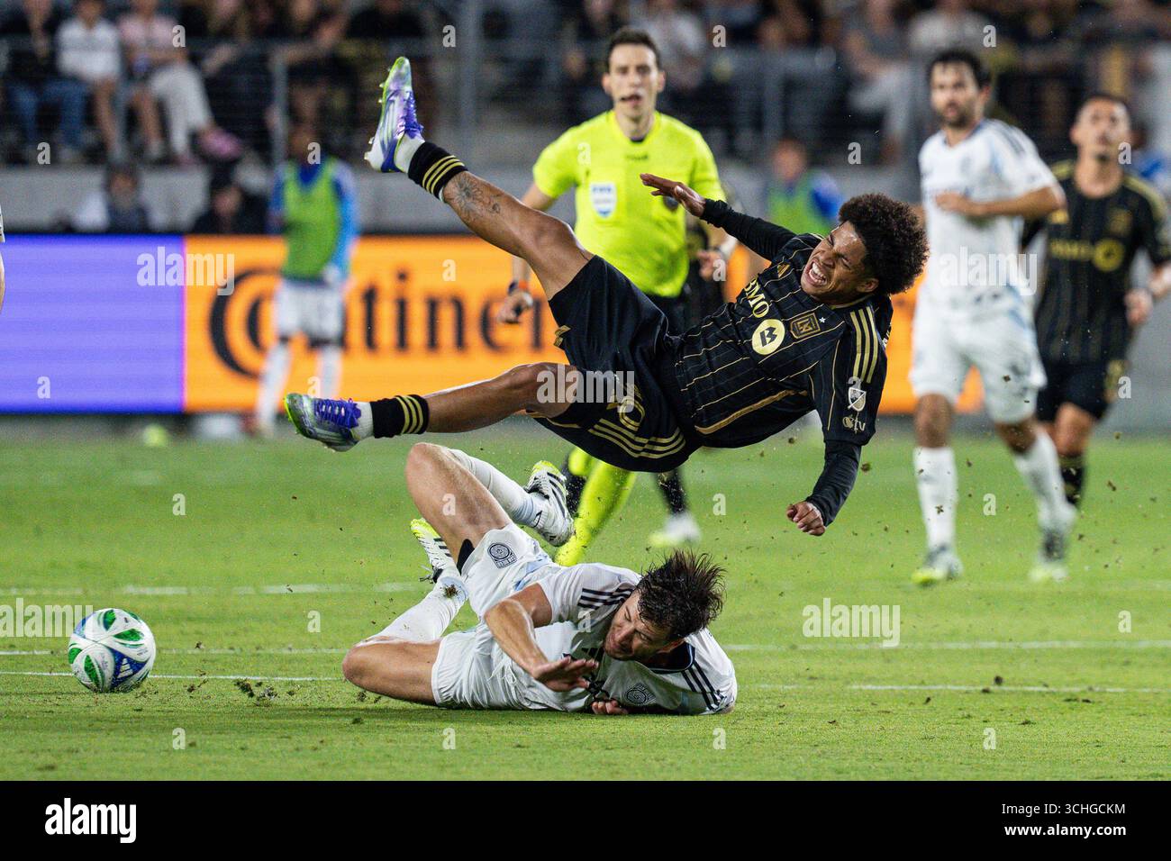 LAFC forward David Martínez (30) is slide tackled by San Diego FC ...