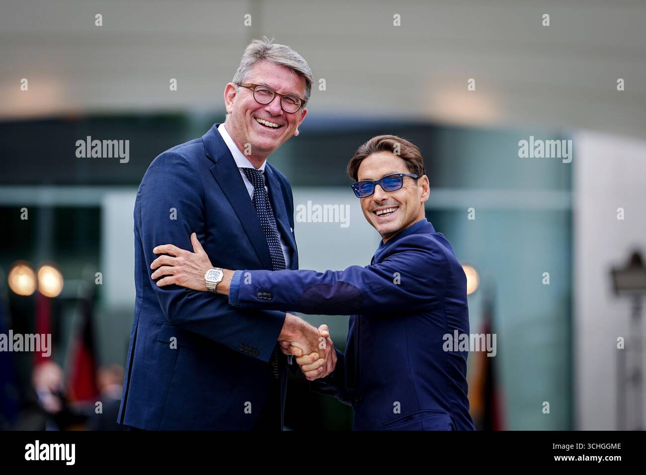 German Minister of State for Culture Wolfgang Weimer, left, receives ...