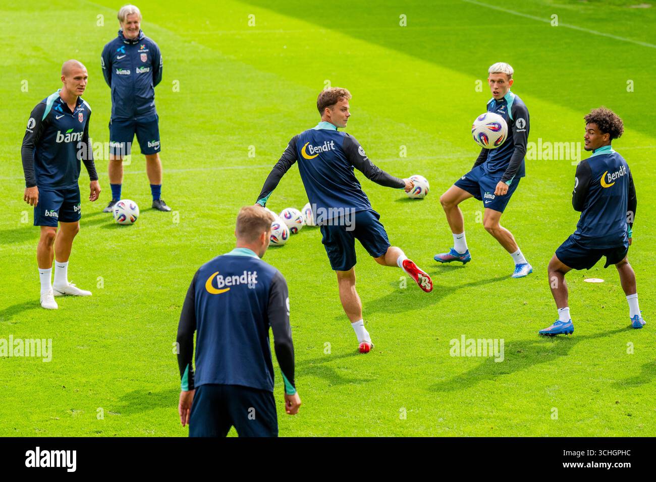 Lillestrøm 20250902. Norway's Leo Skiri Østigård, assistant coach Kent ...