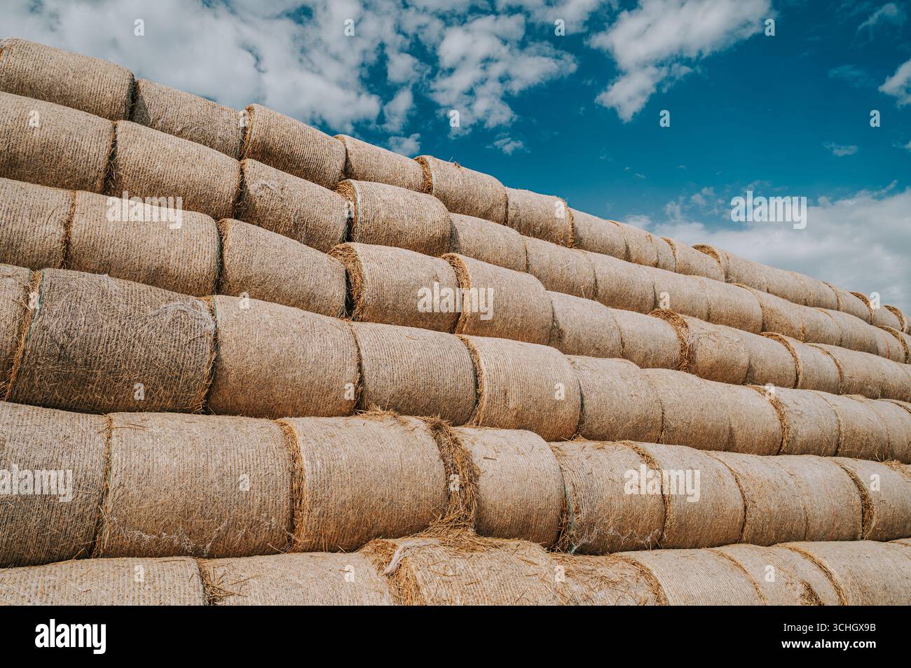 The perfect arrangement of hay bales in a pyramid demonstrates both the ...
