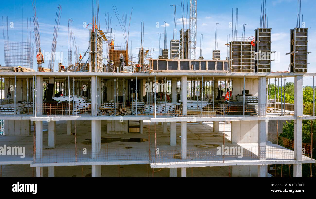 Above view on concrete skeleton of new unfinished multi-storey building ...