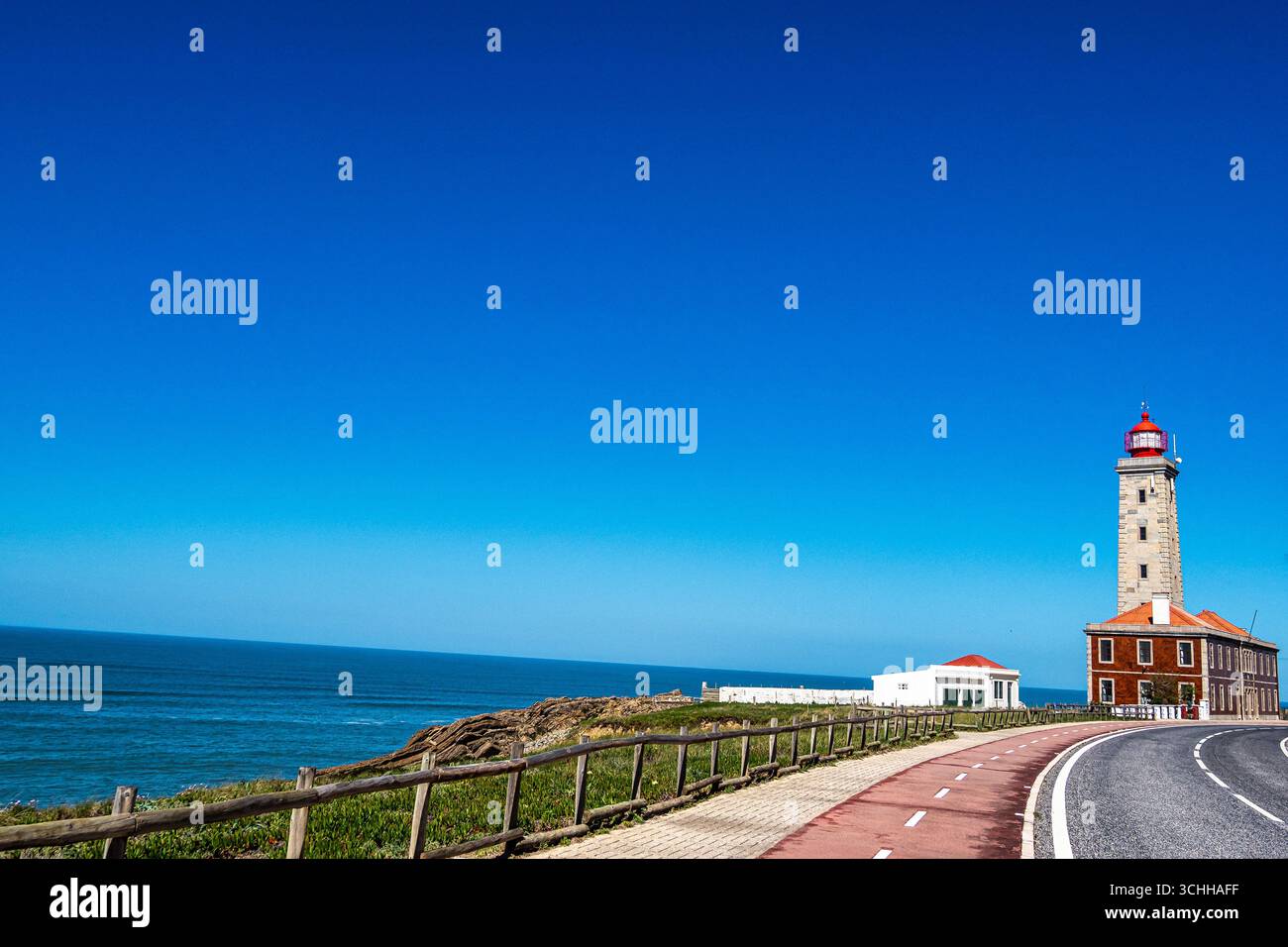 The beautiful Penedo da Saudade Lighthouse at Praia da Concha in Sao ...