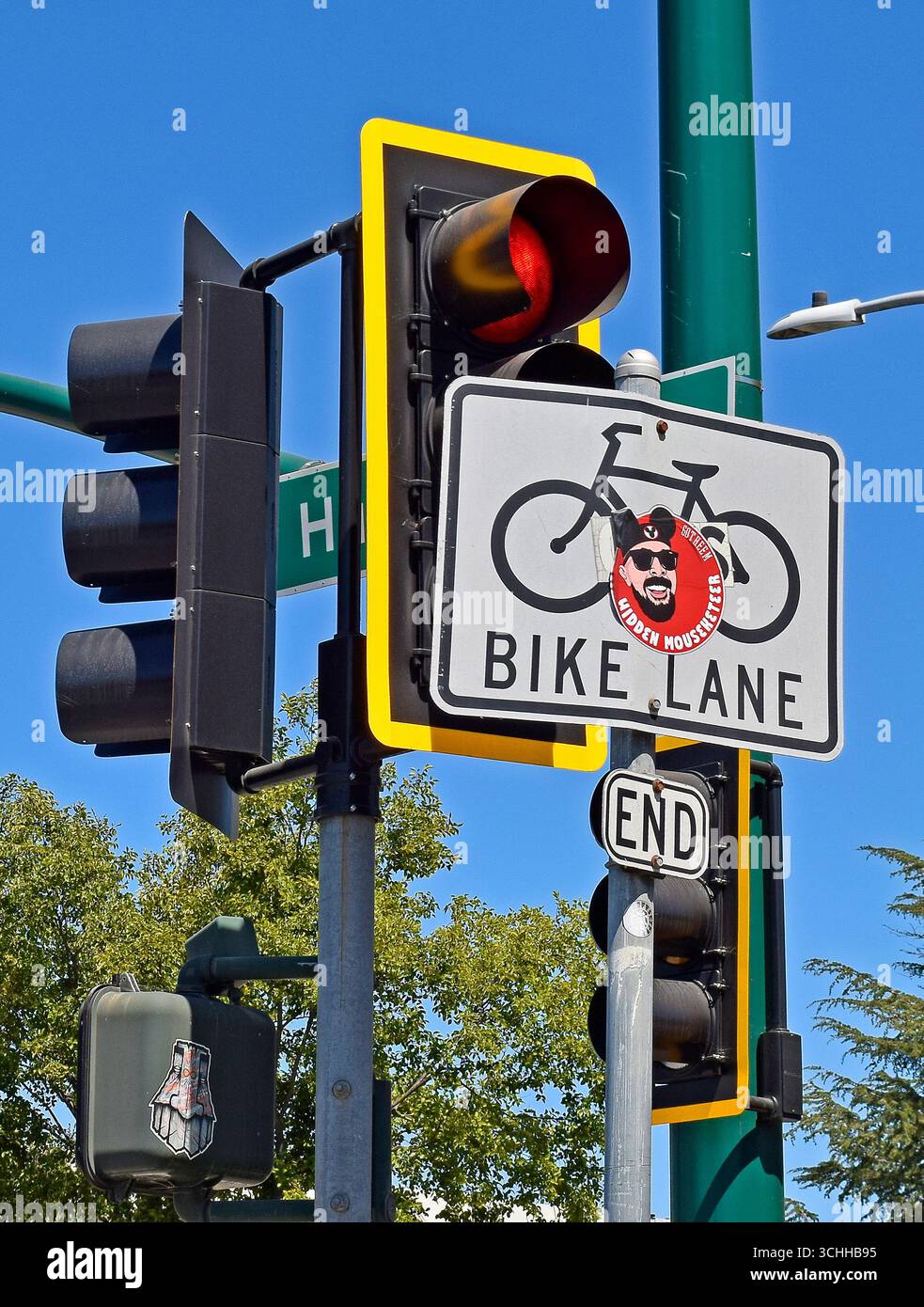 red traffic light and end bike lane sign with a Gotheem Hidden ...
