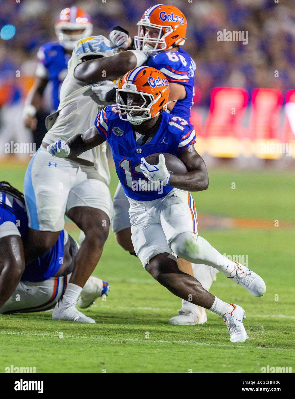 Florida running back Jadan Baugh (13) runs during the first half of an NCAA college football ...
