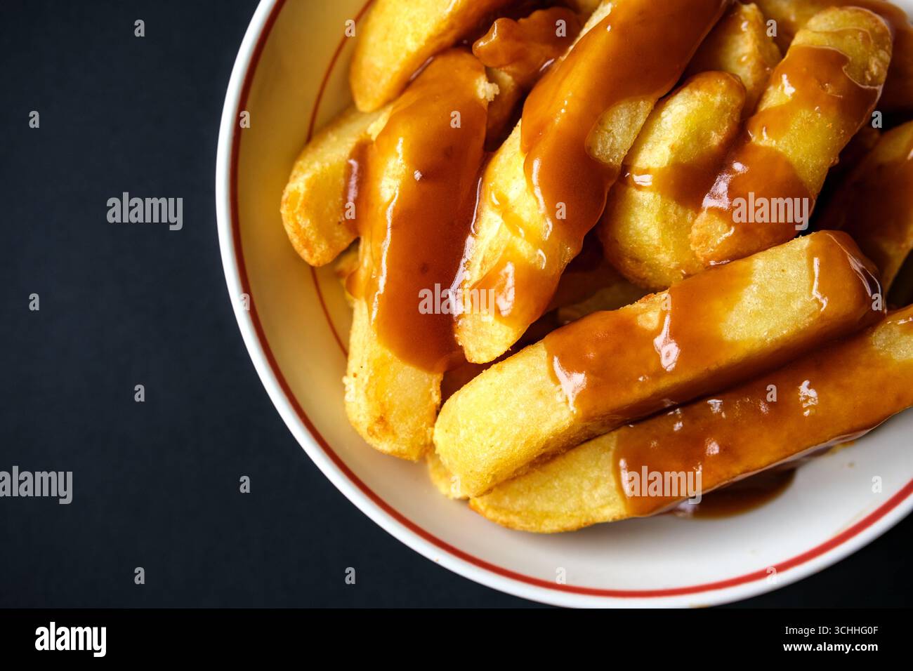 London UK, September 02 2025, Chunky Fried Chips With Beef Gravy and No ...