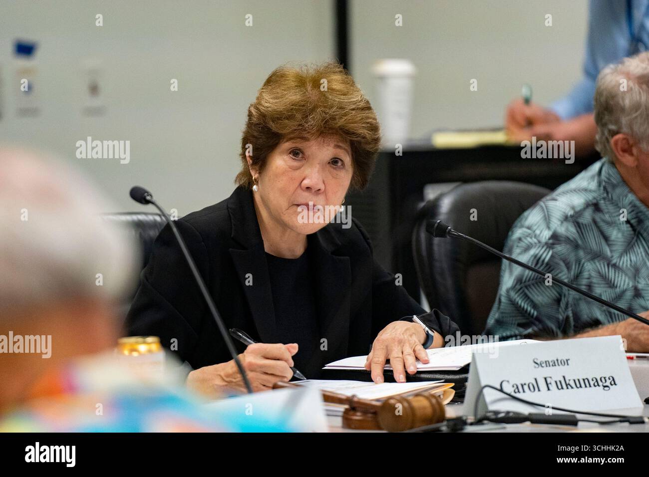 State Sen. Carol Fukunaga, D-Honolulu, watches a colleague speak during ...