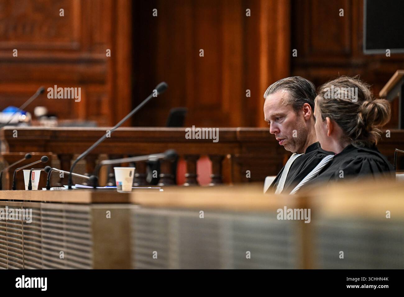Lawyers pictured during the composition of the jury for the trial of ...