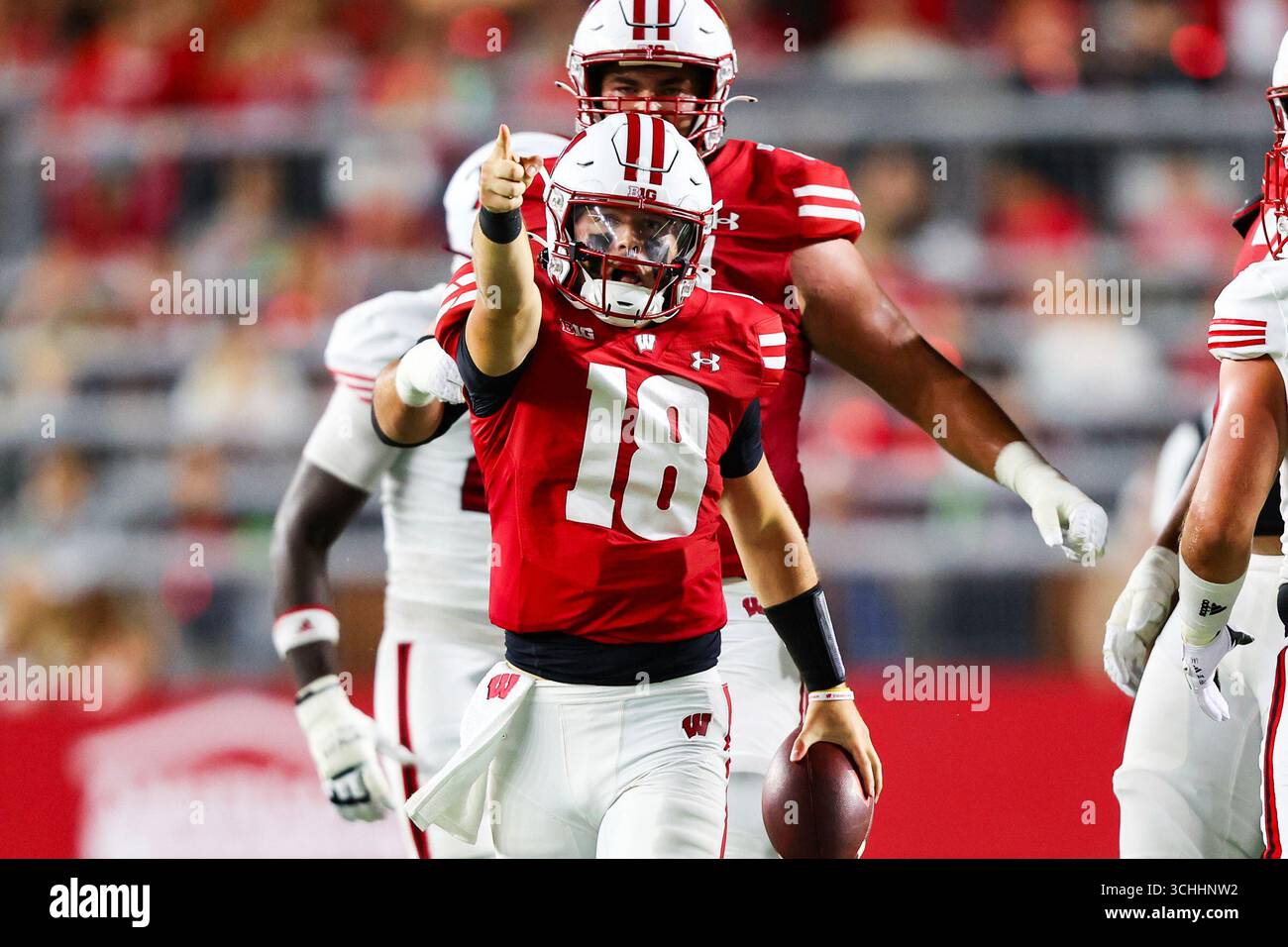 Wisconsin quarterback Danny O'Neil (18) celebrates after a first down ...