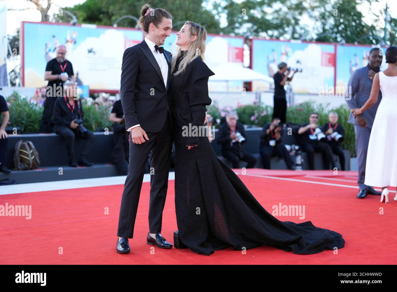 Rory St. Clair Gainer and Rebecca Ferguson attend "A House Of Dynamite ...