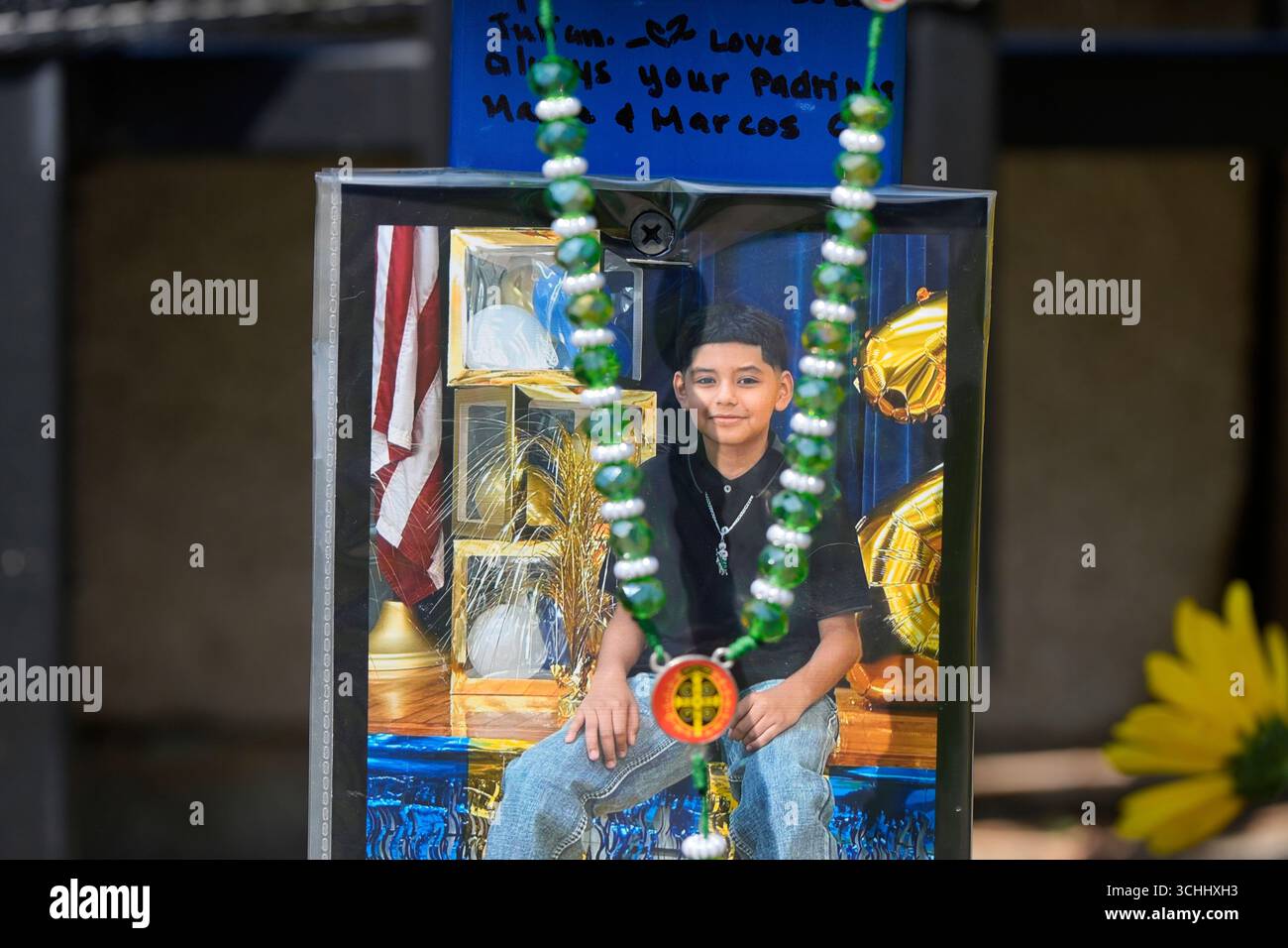A makeshift memorial for 11-year-old Julian Guzman, who was shot and ...