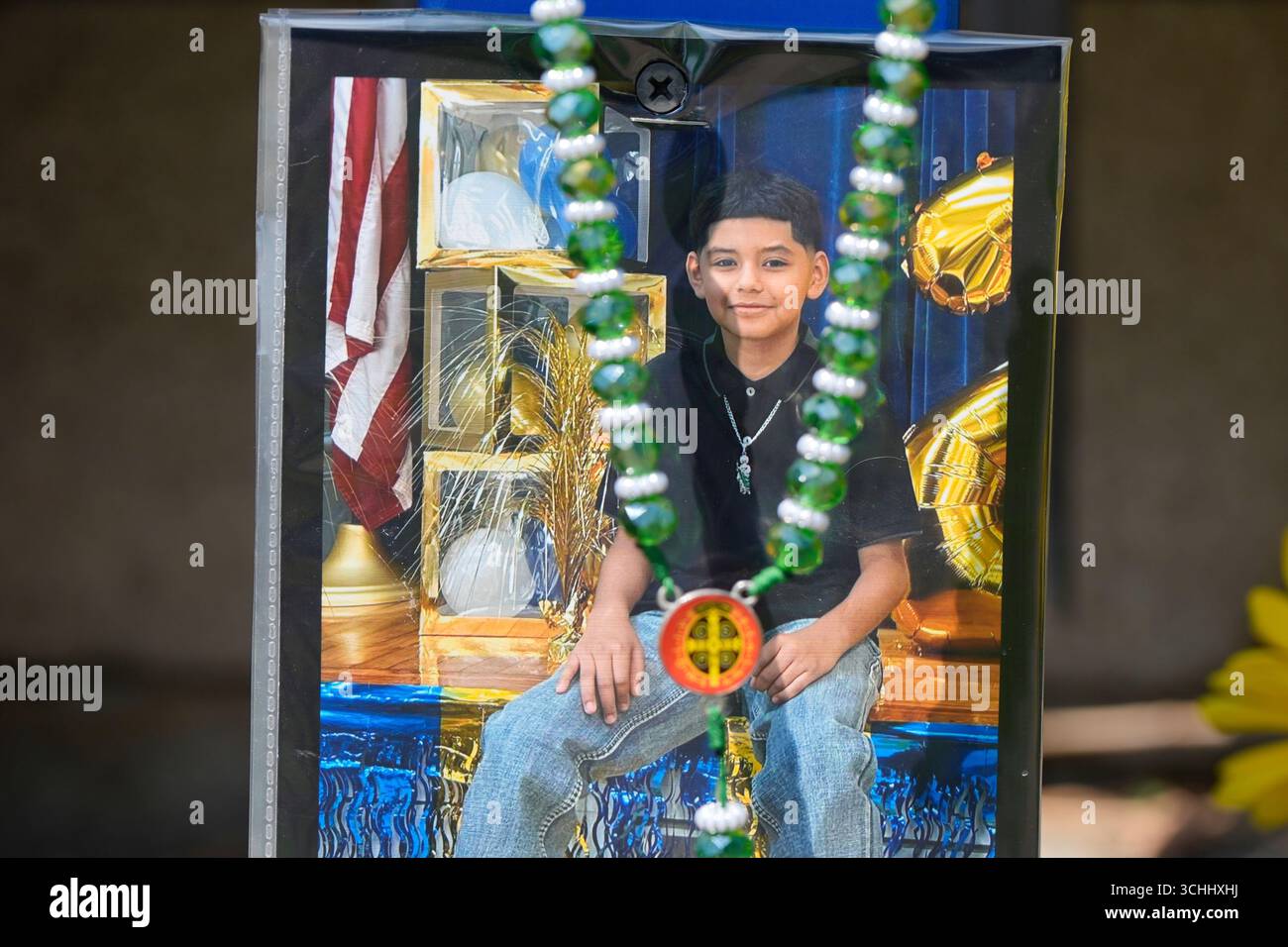 A makeshift memorial for 11-year-old Julian Guzman, who was shot and ...