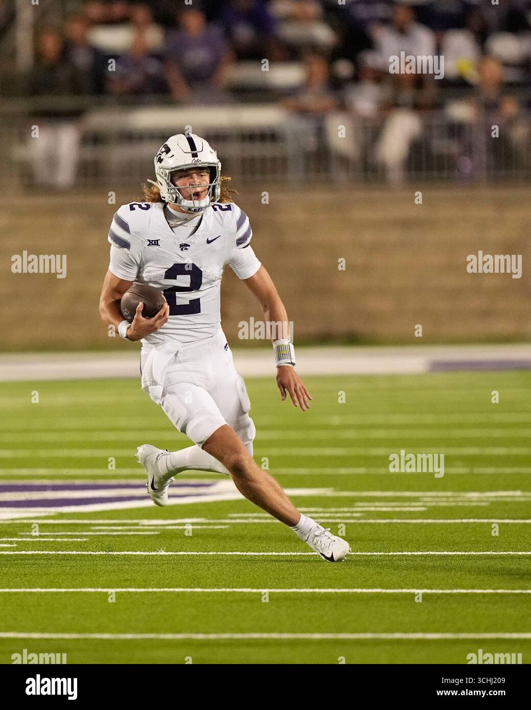 Kansas State quarterback Avery Johnson runs the ball during the second ...