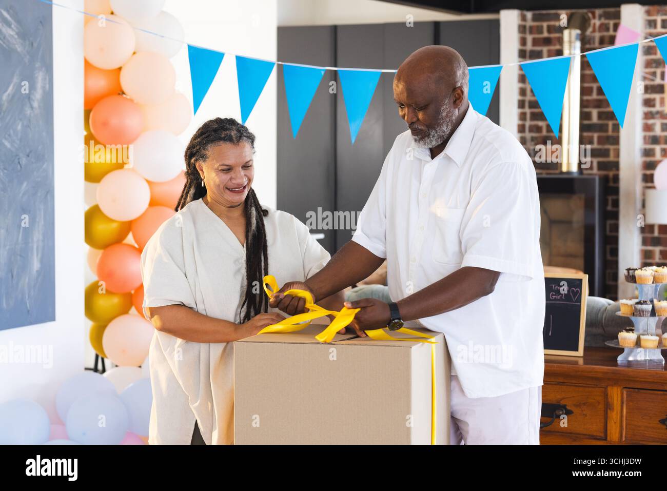 Couple unboxing presents hi-res stock photography and images - Alamy