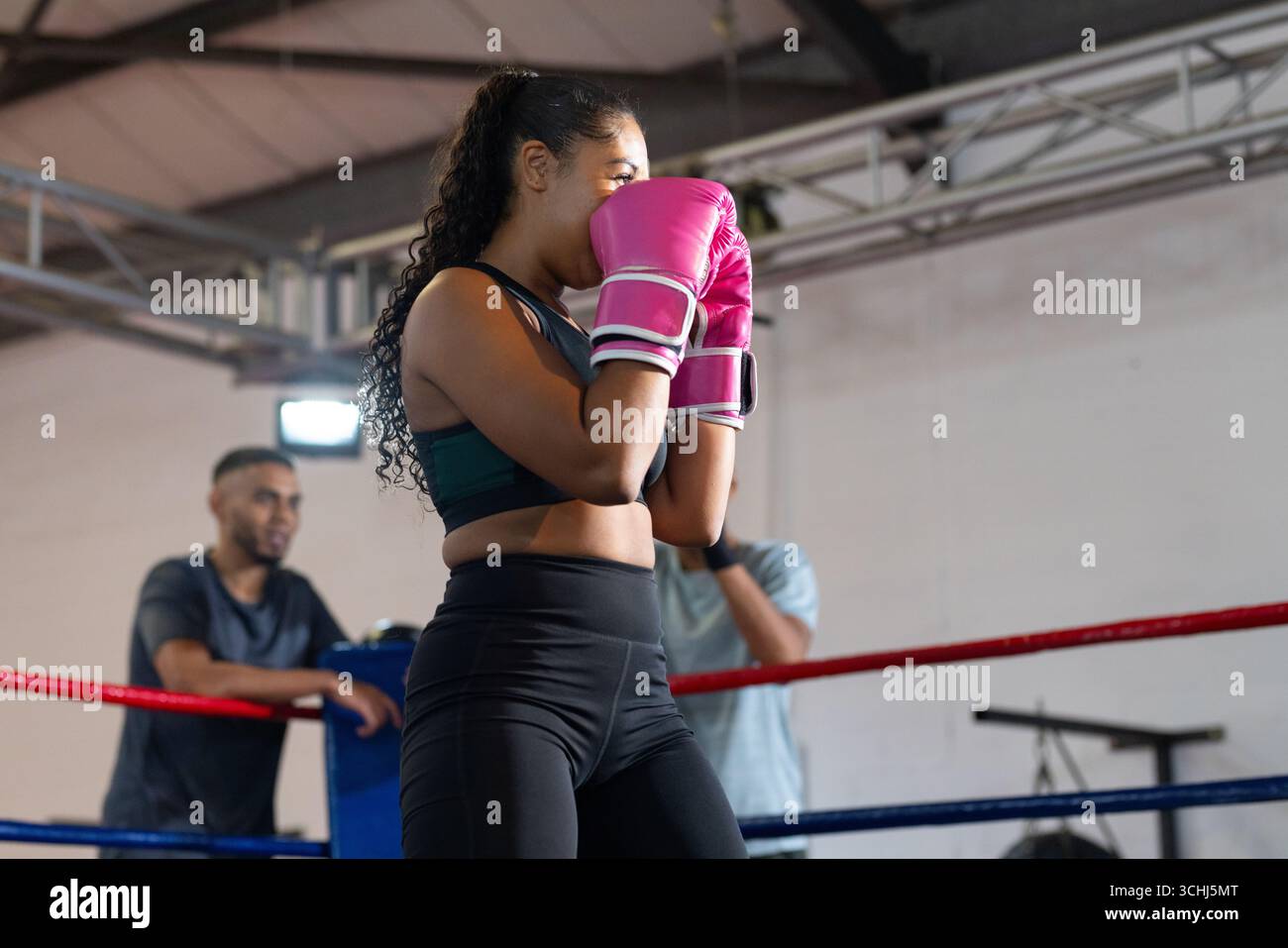 Young adult female boxer shadowboxing hi-res stock photography and images - Alamy