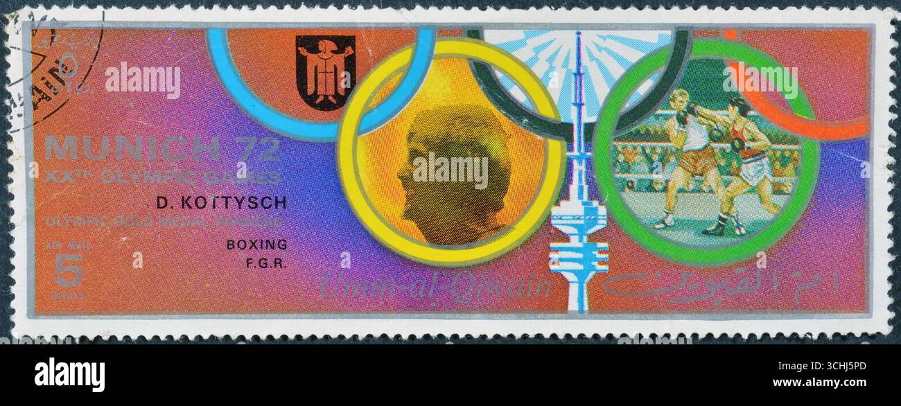 Cancelled postage stamp printed by Umm al-Qiwain, that shows Gold medal ...
