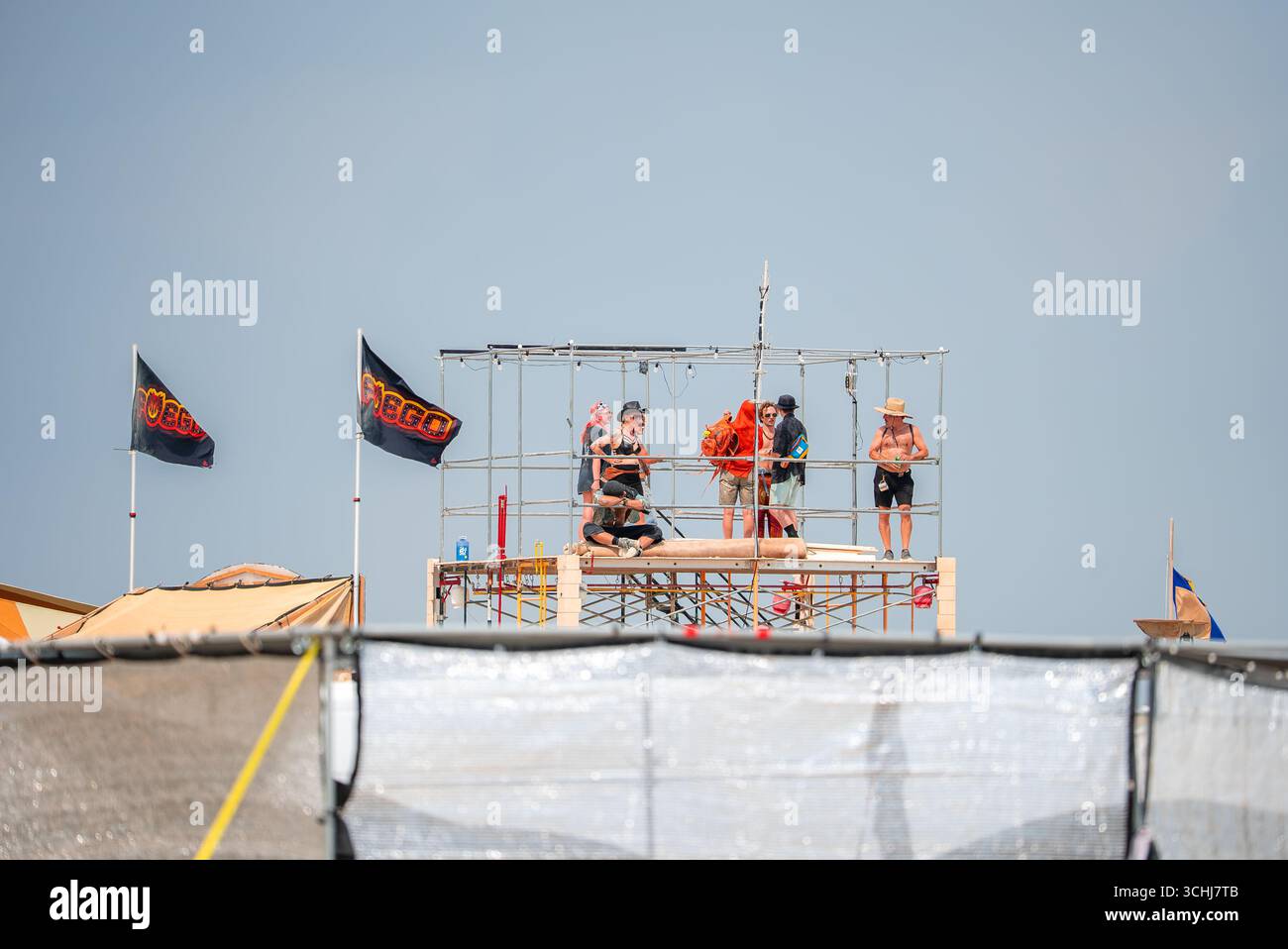 Scaffold Structure with EGO Flags at Burning Man Festival 2025 Stock ...