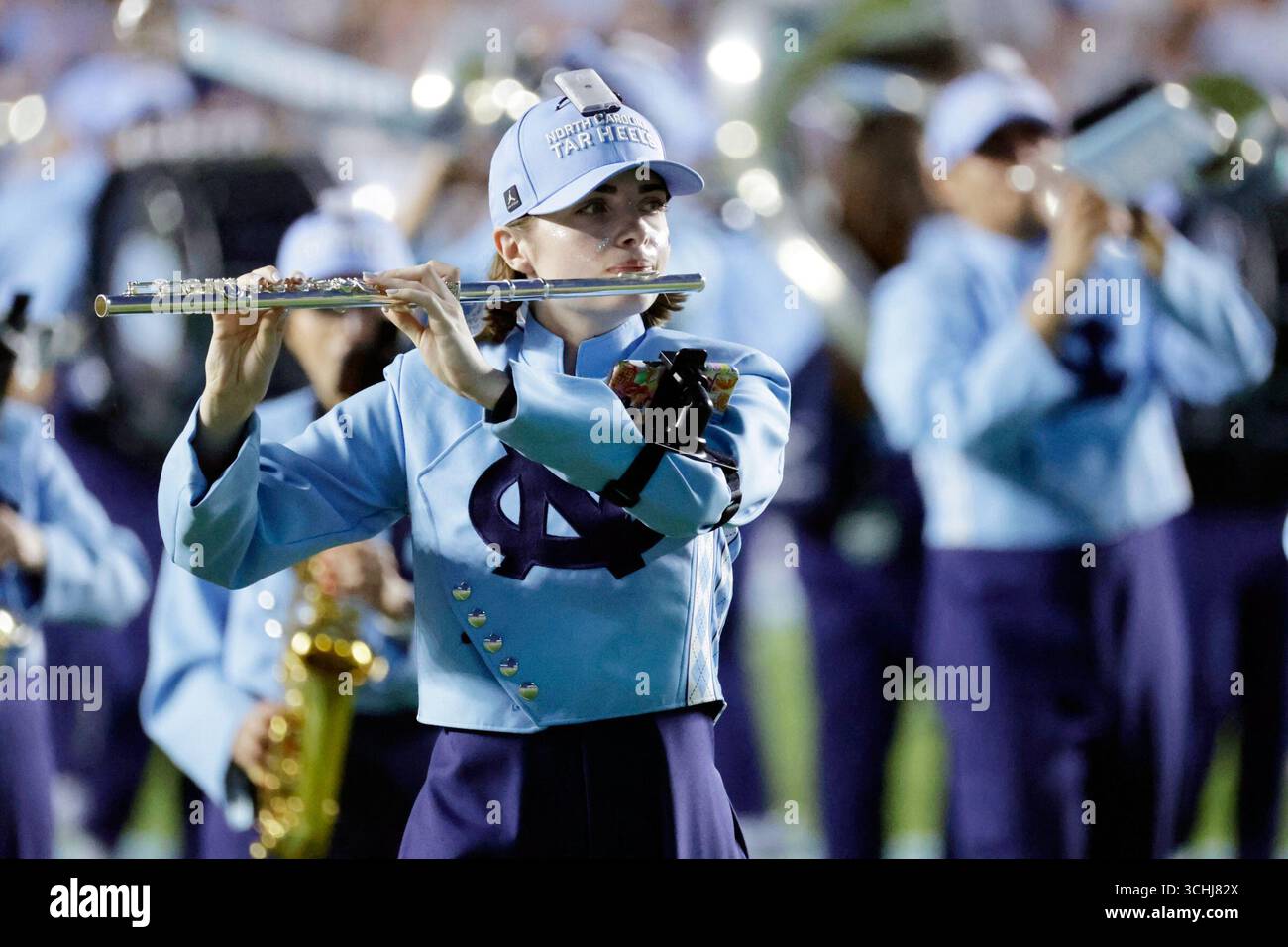 The North Carolina band plays before the start of an NCAA college ...