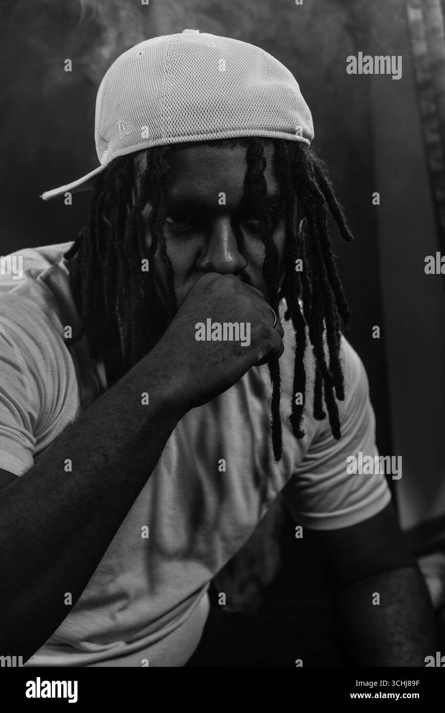 Cheerful black male wearing Black and White Stock Photos & Images - Alamy