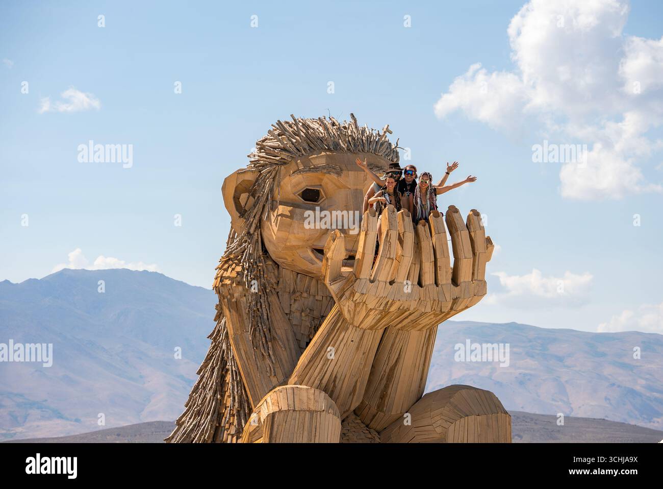 Large Wooden Sculpture of Seated Humanoid with Animal Features in ...