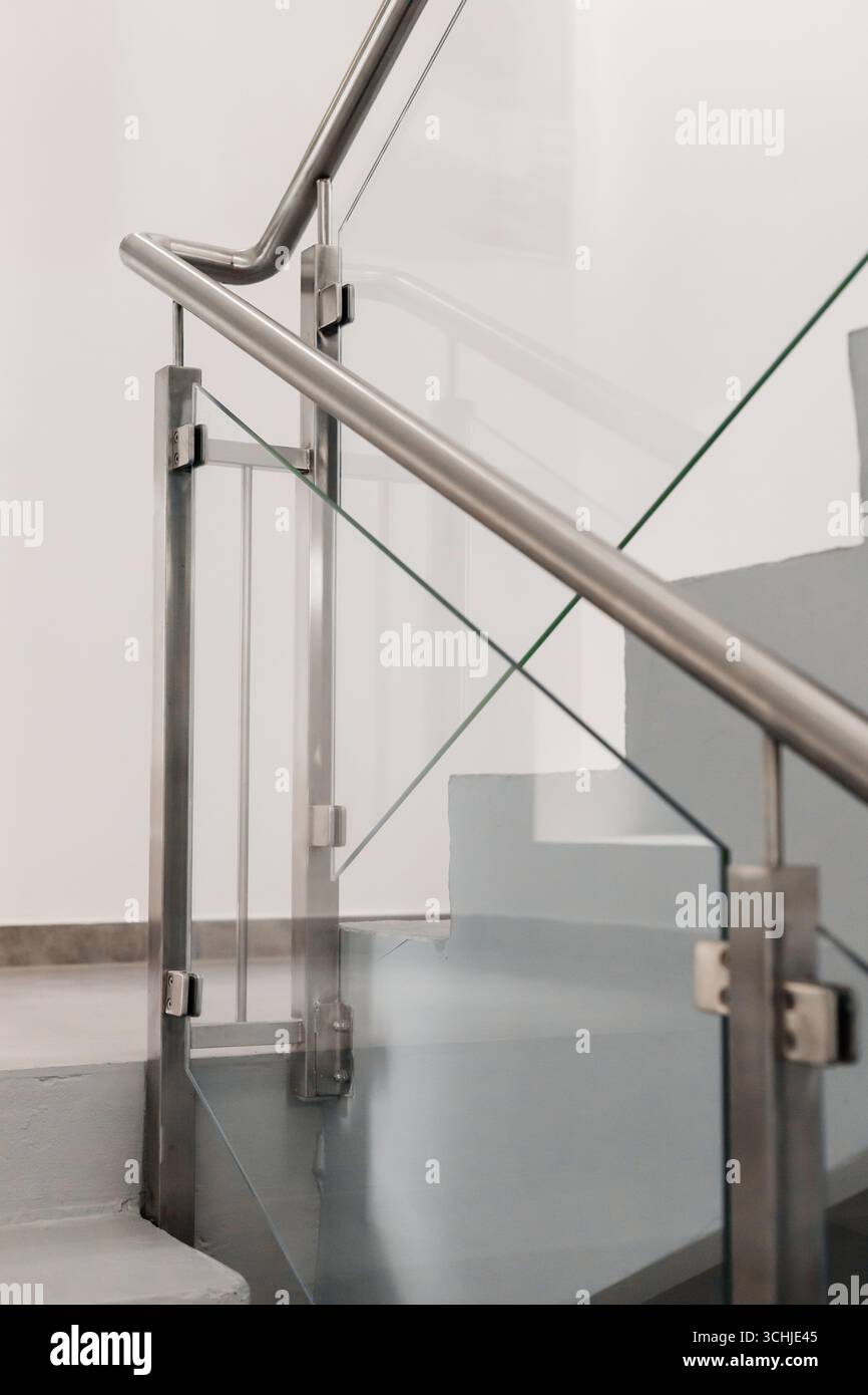 Elegant staircase sleek glass railing hi-res stock photography and ...