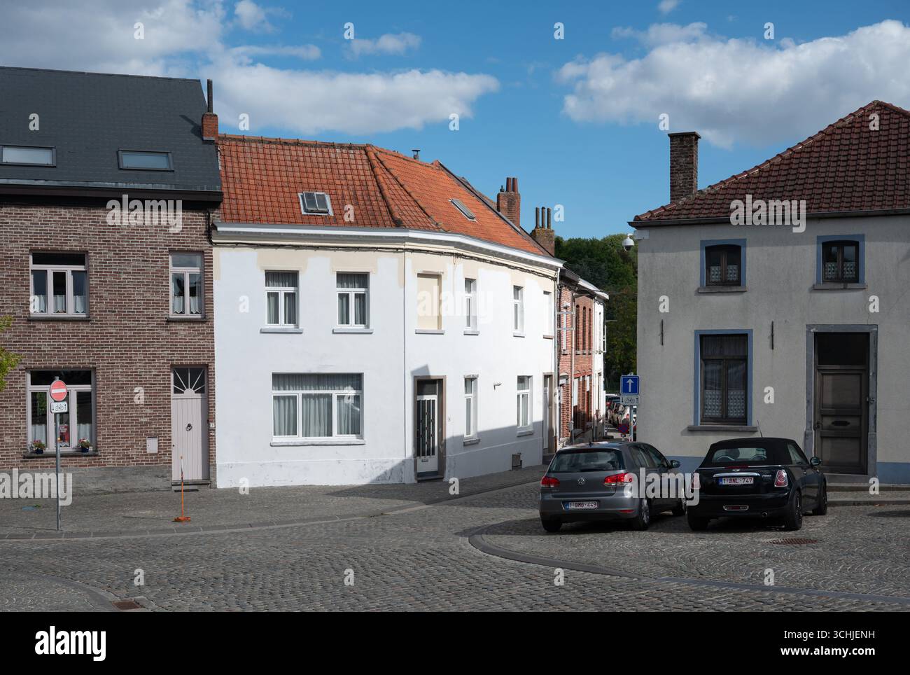 Modest houses in a row in the village center of Wauthier Braine ...