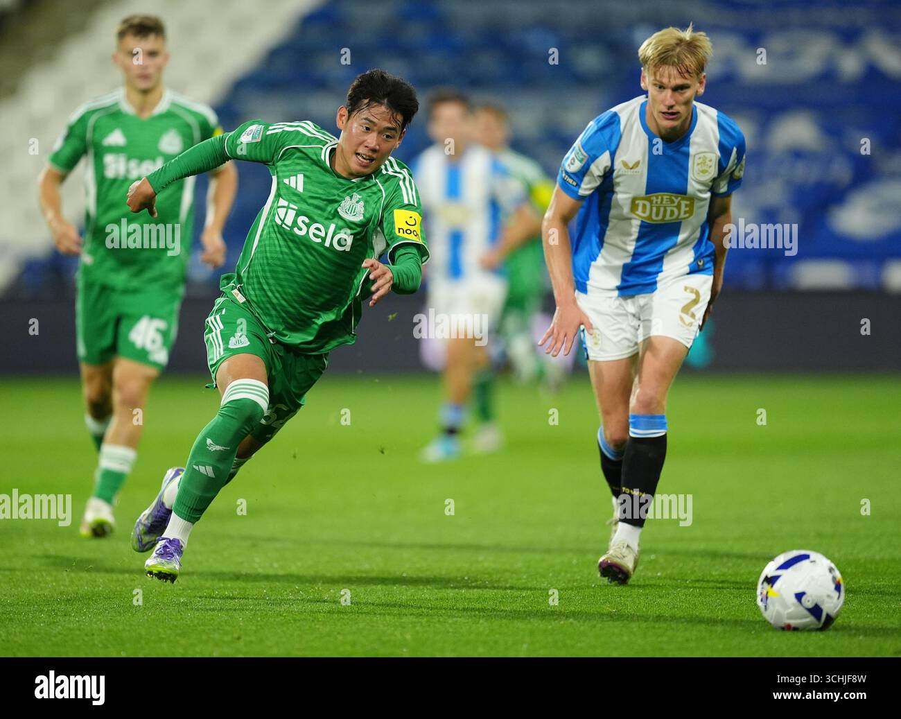 Newcastle United's Park Seung Soo (left) and Hudderfield Town's Lasse ...