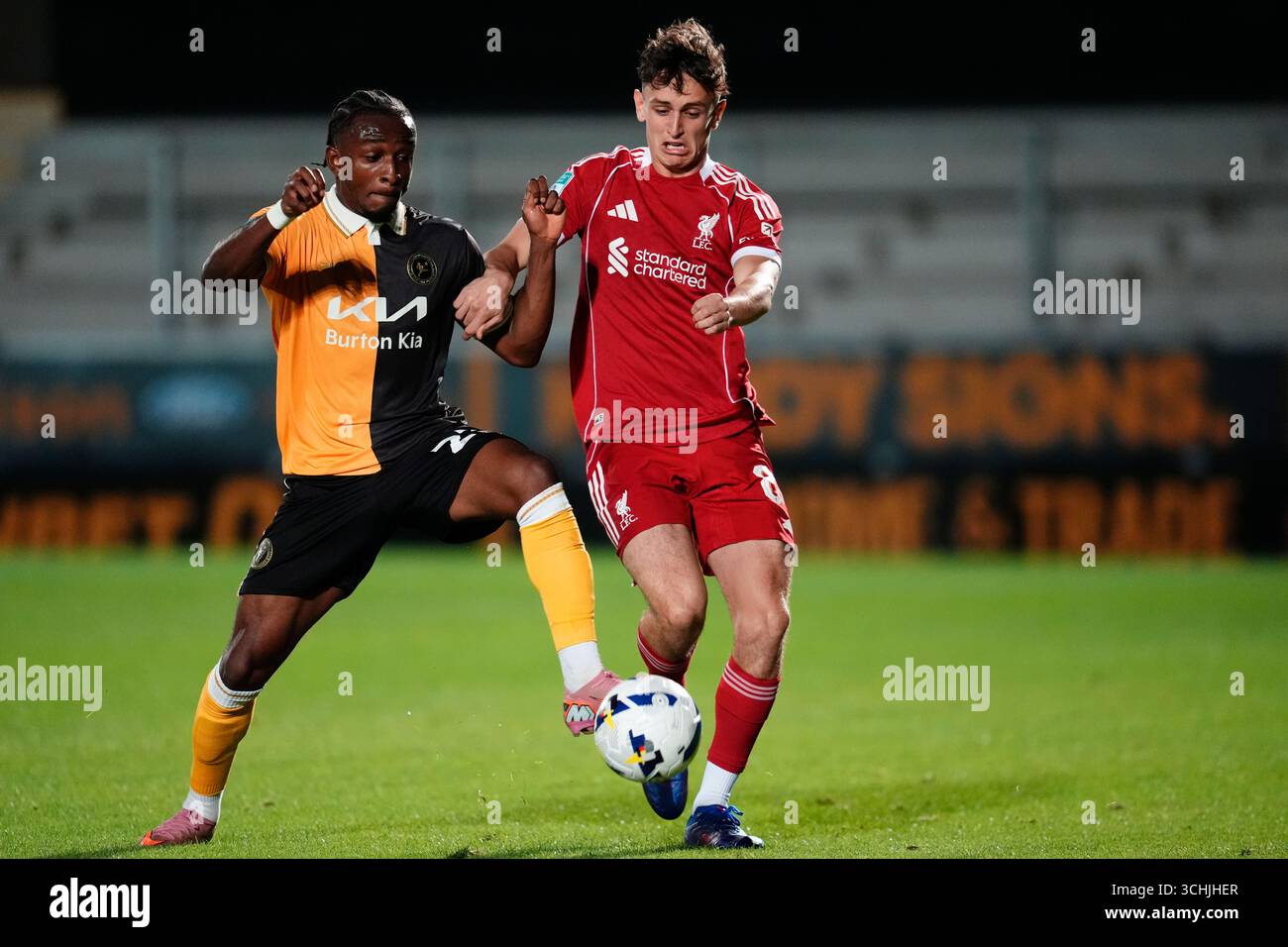 Burton Alboin's Sebastian Revan (left) and Liverpool's Lucas Pitt ...
