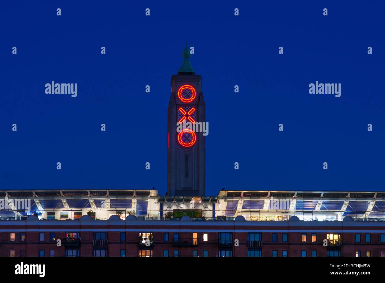 The Oxo Tower restaurant illuminated at night, Barge House St, London ...