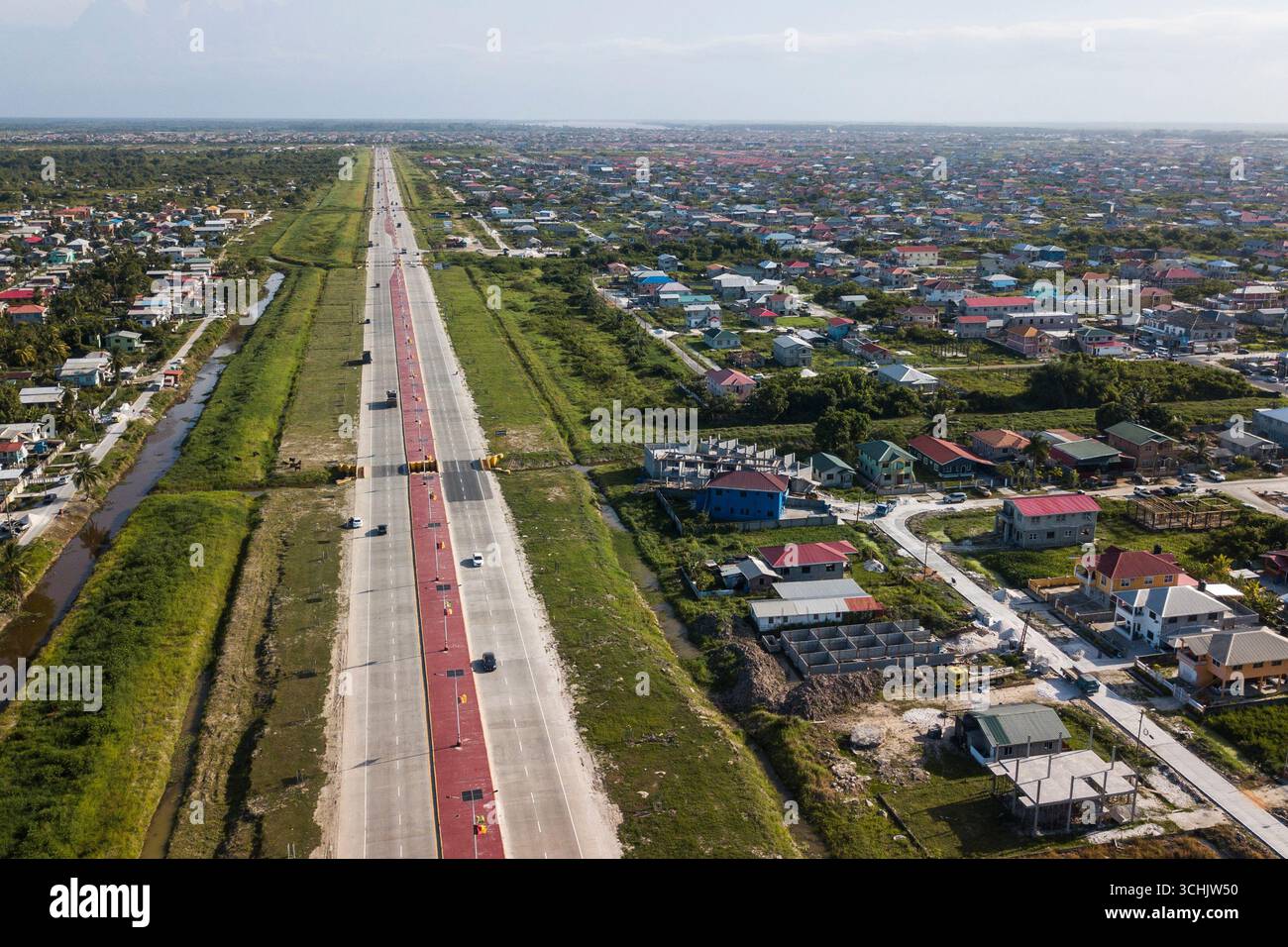 Cars drive along a newly built highway in the Arcadia area of ...