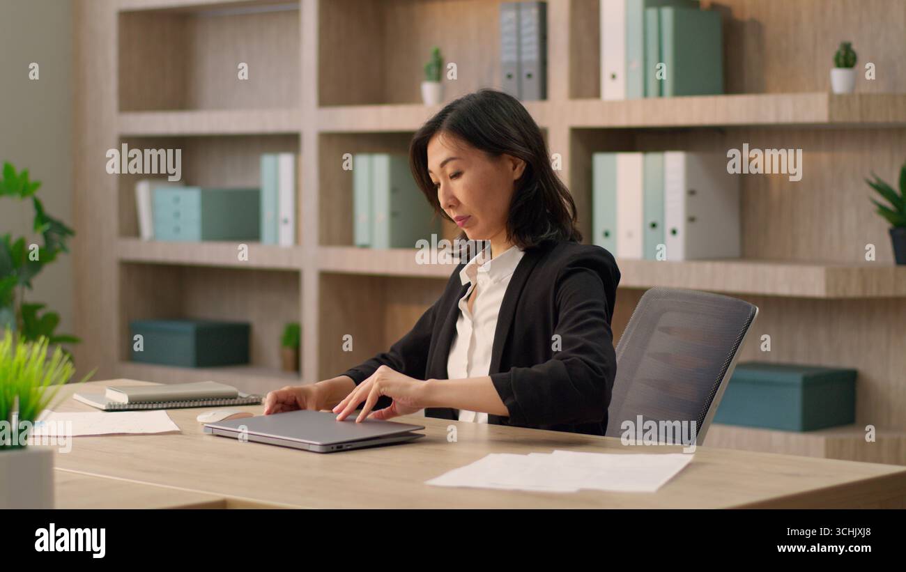 Asian smiling businesswoman adult chinese korean girl female boss sit ...