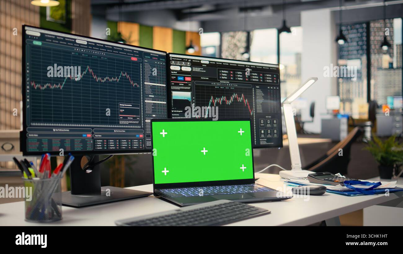 Stock market metrics diagrams displayed on green screen laptop in prop ...