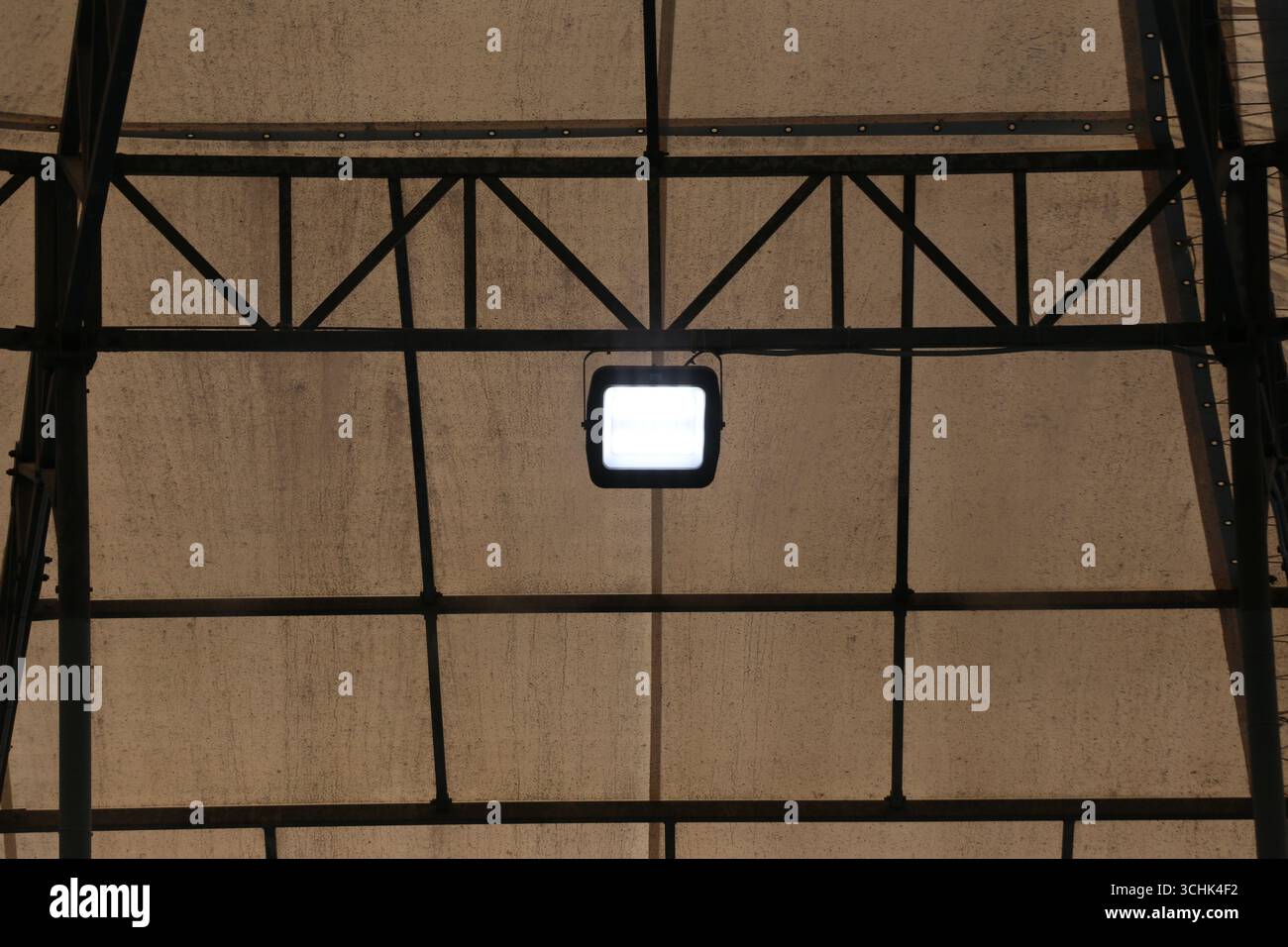 This image showcases a bright ceiling light fixture illuminating an ...