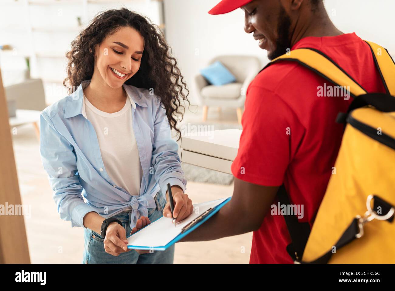 Customer Receiving Order From Restaurant Signing Paper Form Stock Photo ...