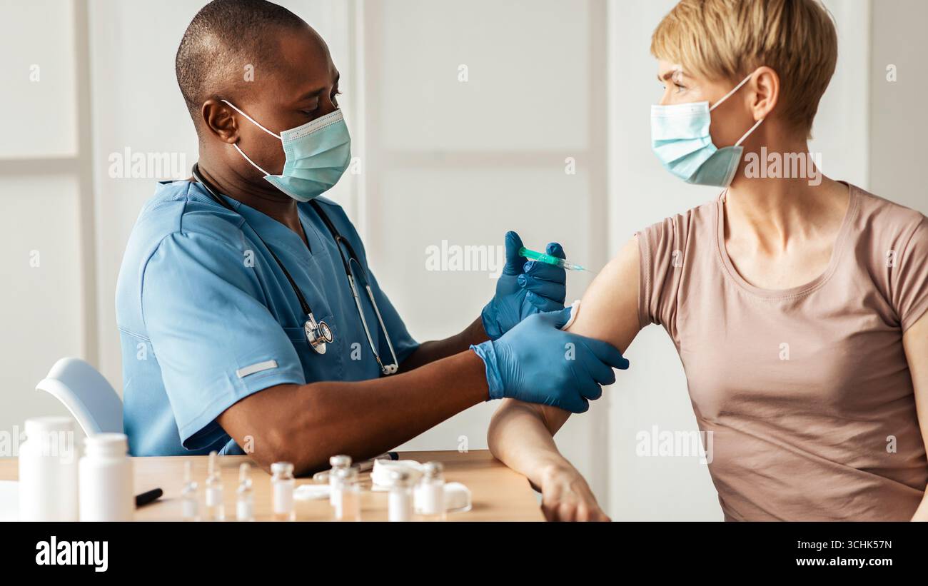 Work of medical worker in vaccination center and health care Stock ...