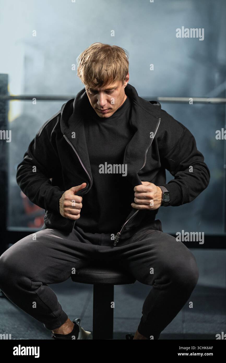 Man sits on bench dimly hi-res stock photography and images - Alamy