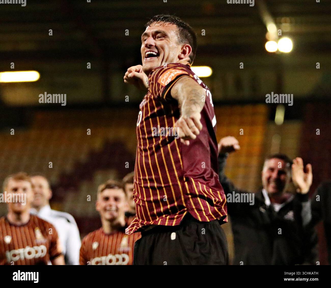 Andy Cook of Bradford City celebrates after The Vertu Trophy match ...