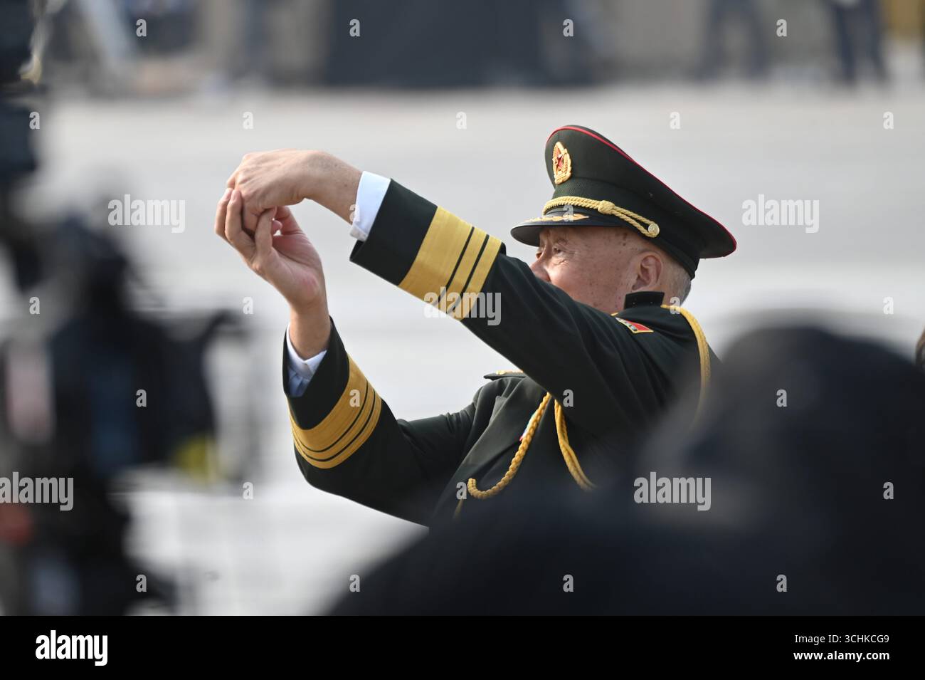 03 September 2025, China, Peking: Army veterans enjoy themselves before ...