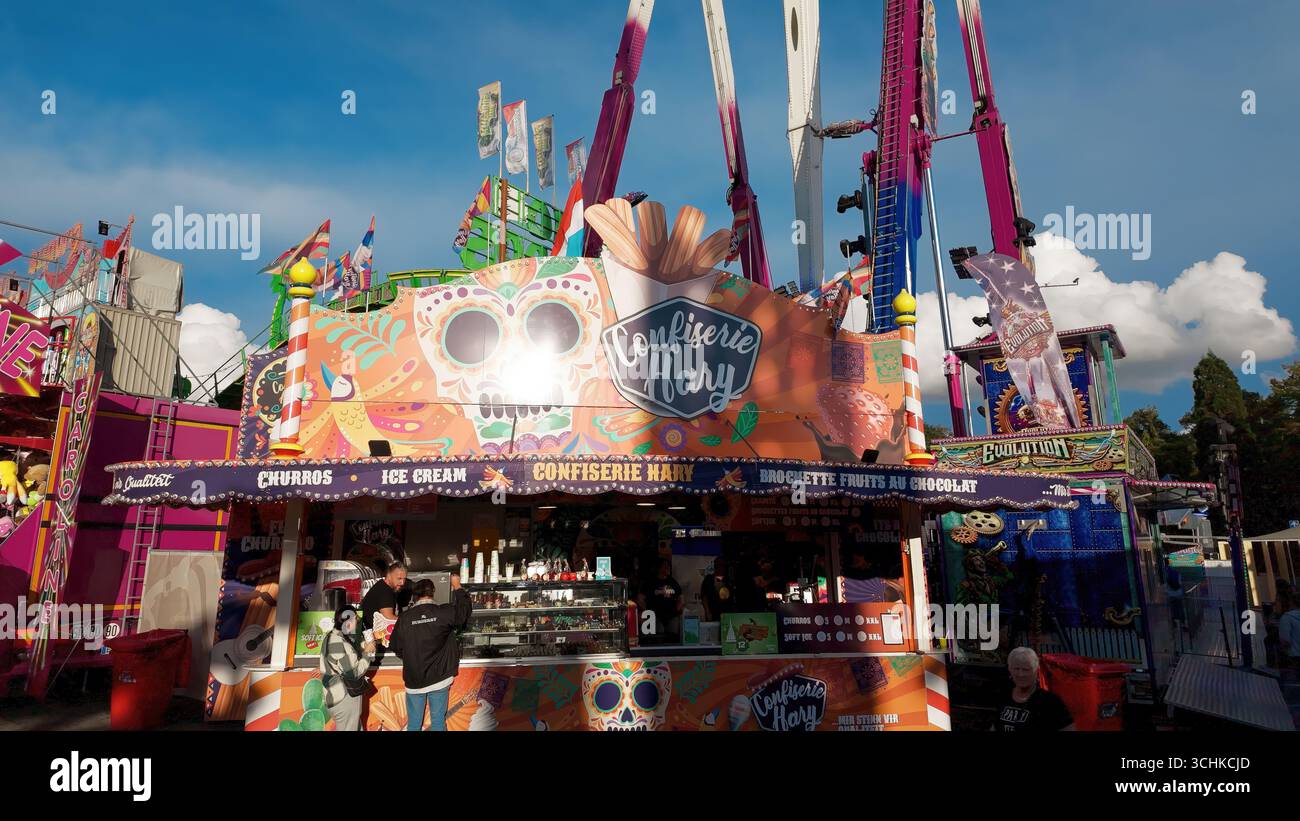 LUXEMBURG, EUROPE - SEPTEMBER 1, 2025 - Colorful food stall selling ...