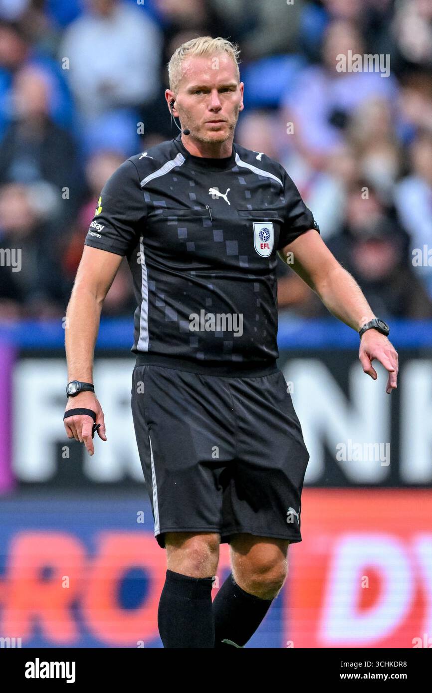 Referee Andrew Humphries during the The Vertu Trophy match Bolton ...