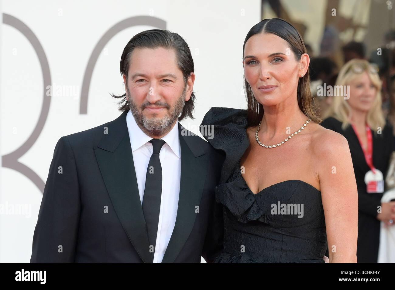 Greg Shapiro (l) and a guest (r) attend the "A house of dynamite" red ...